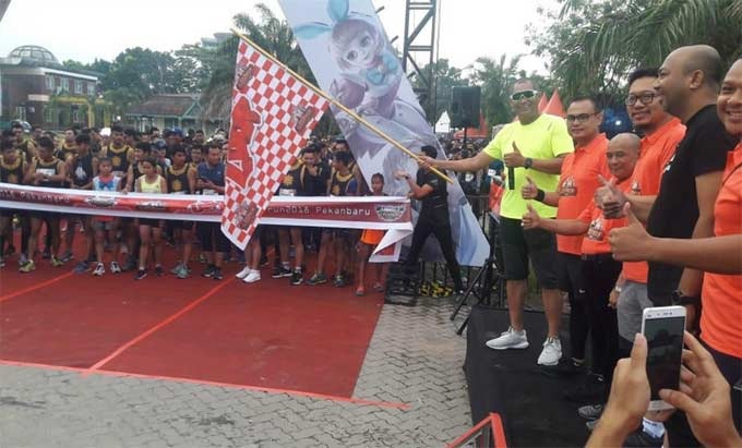 Tajaan Telkomsel, Ribuan Runners Sukseskan I LOOP RUN 2018 di Pekanbaru